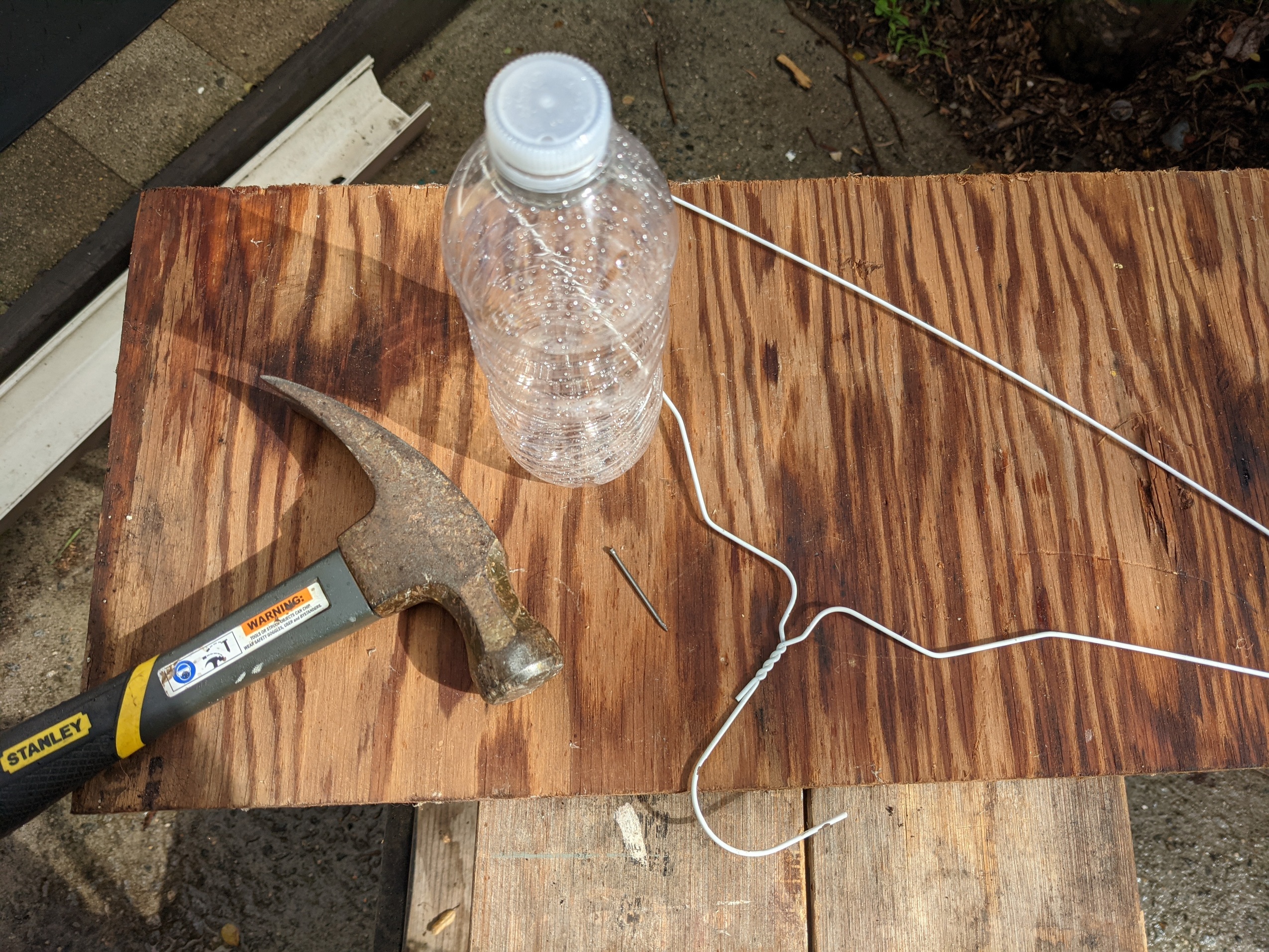 Garden Hack: DIY Water Bottle Drip Watering System | Sage's Acre